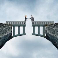 >> Bridging Divides – Building Bridges